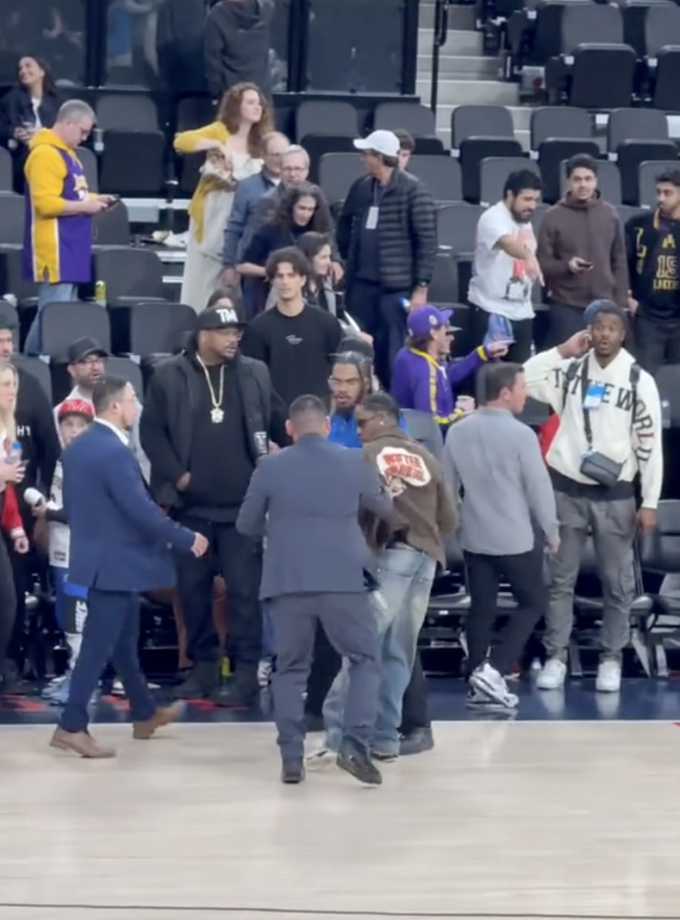 Travis Scott Grabbed By Security Guard NBA Game Video Goes Viral