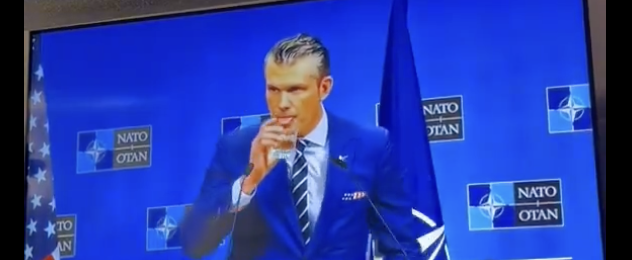 Pete Hegseth Drinking at Podium Video